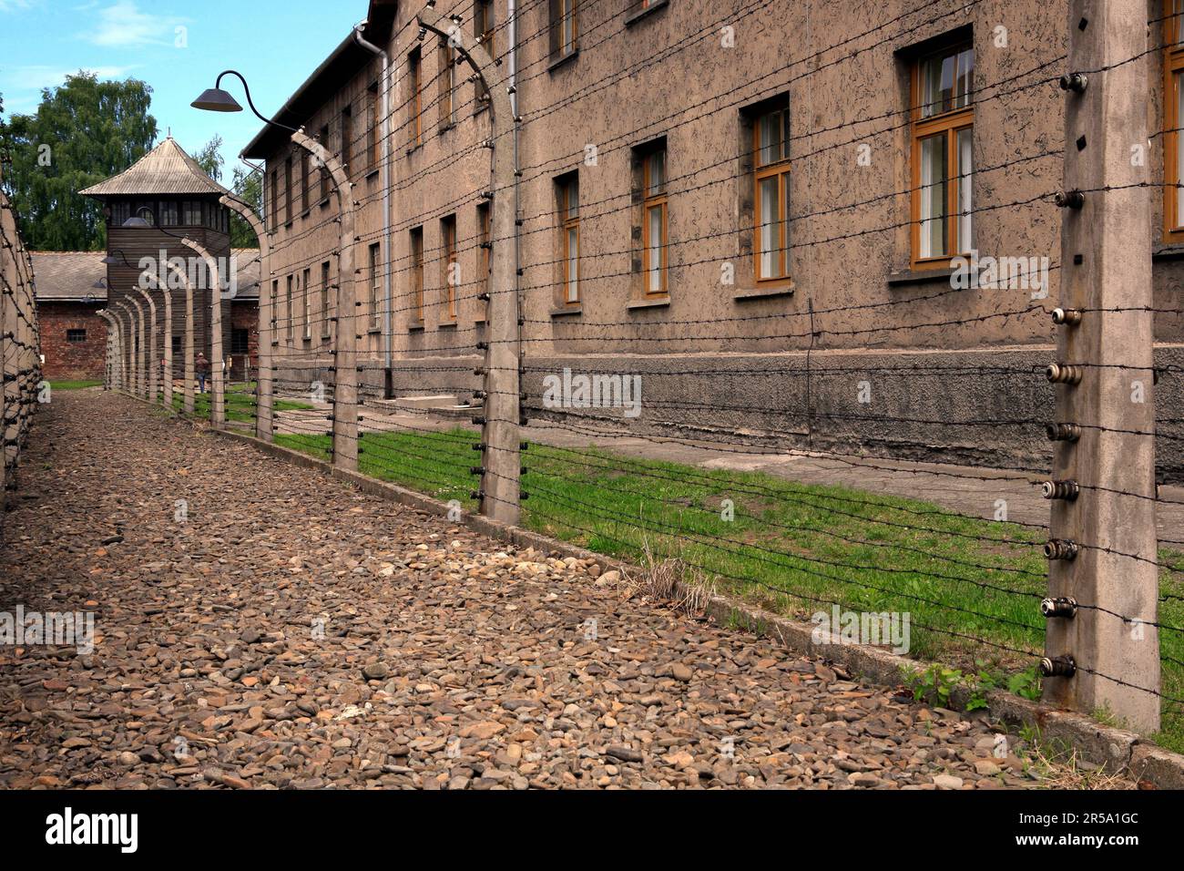 Concentration camp buildings and fence in Auschwitz Stock Photo - Alamy