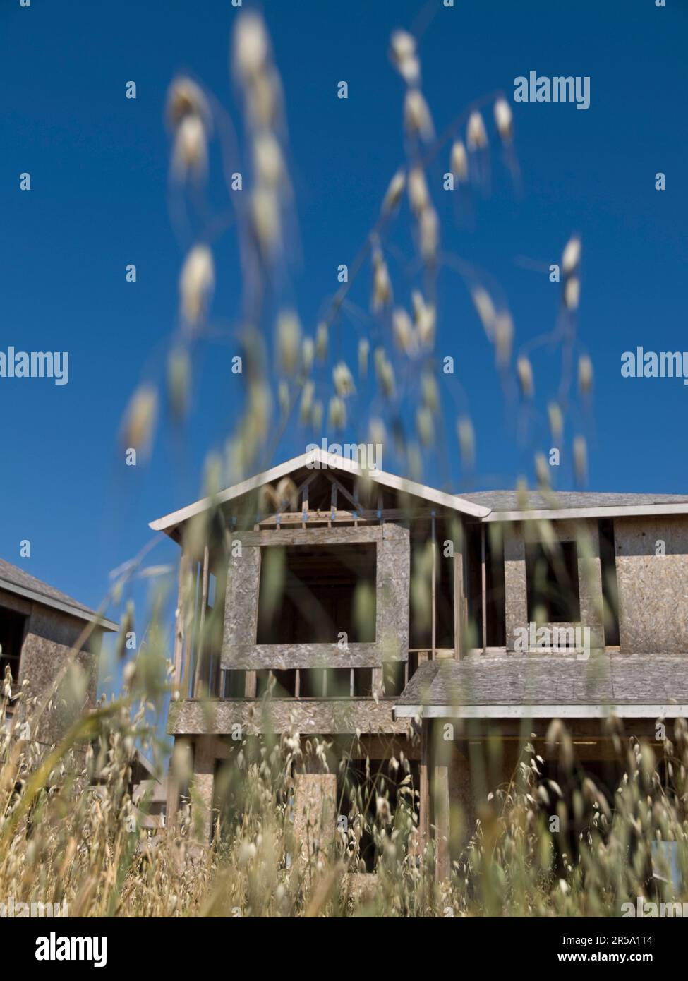 Structures in a failed and abandoned housing development Stock Photo ...