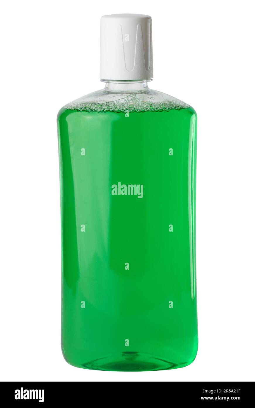 Green refreshing mouthwash in a transparent plastic bottle on a white ...