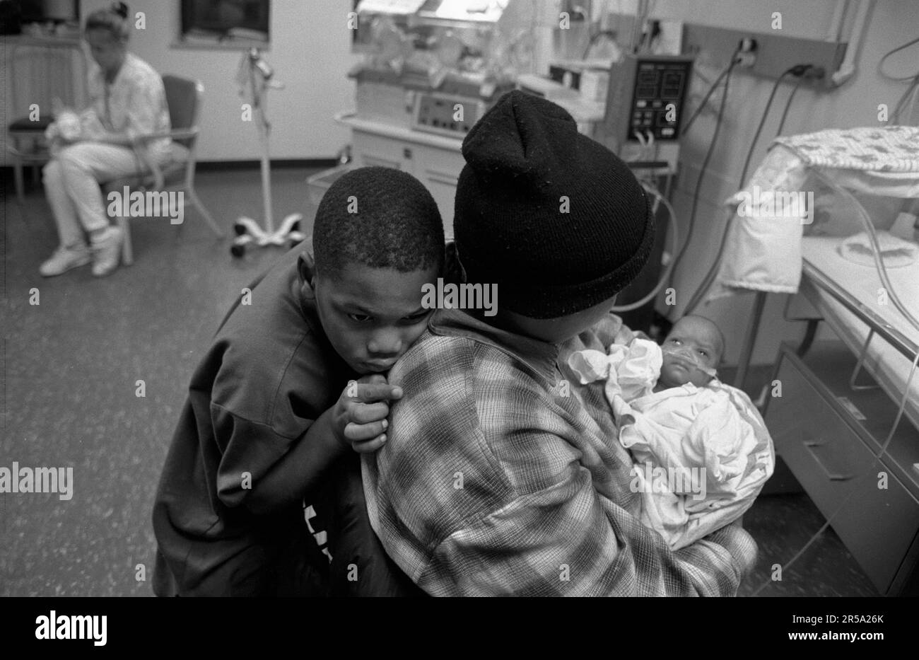 The struggles of a single mom making minimum wage Stock Photo - Alamy