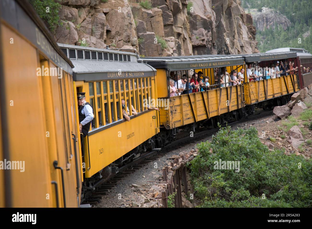 The Durango and Silverton Narrow Gauge Railroad chugs along the Animas ...