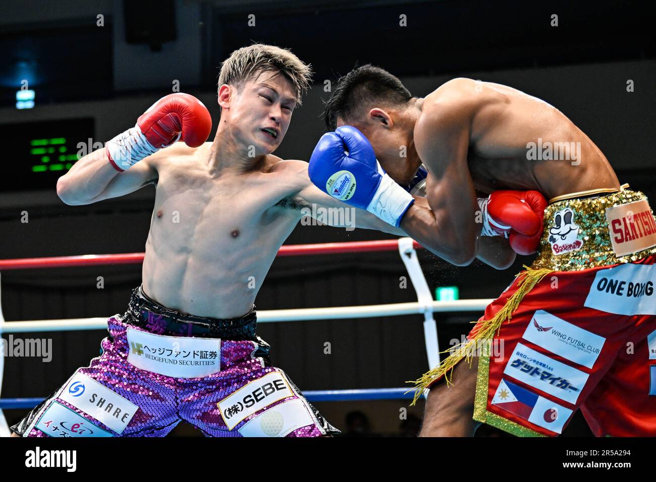 Tokyo, Japan. 31st May, 2023. Hayato Tsutsumi (red gloves) of Japan and ...