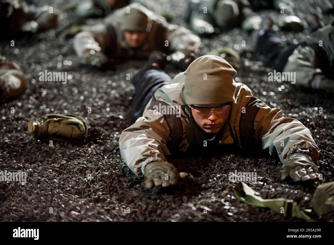Soldiers in basic training do superman exercises during the physical ...