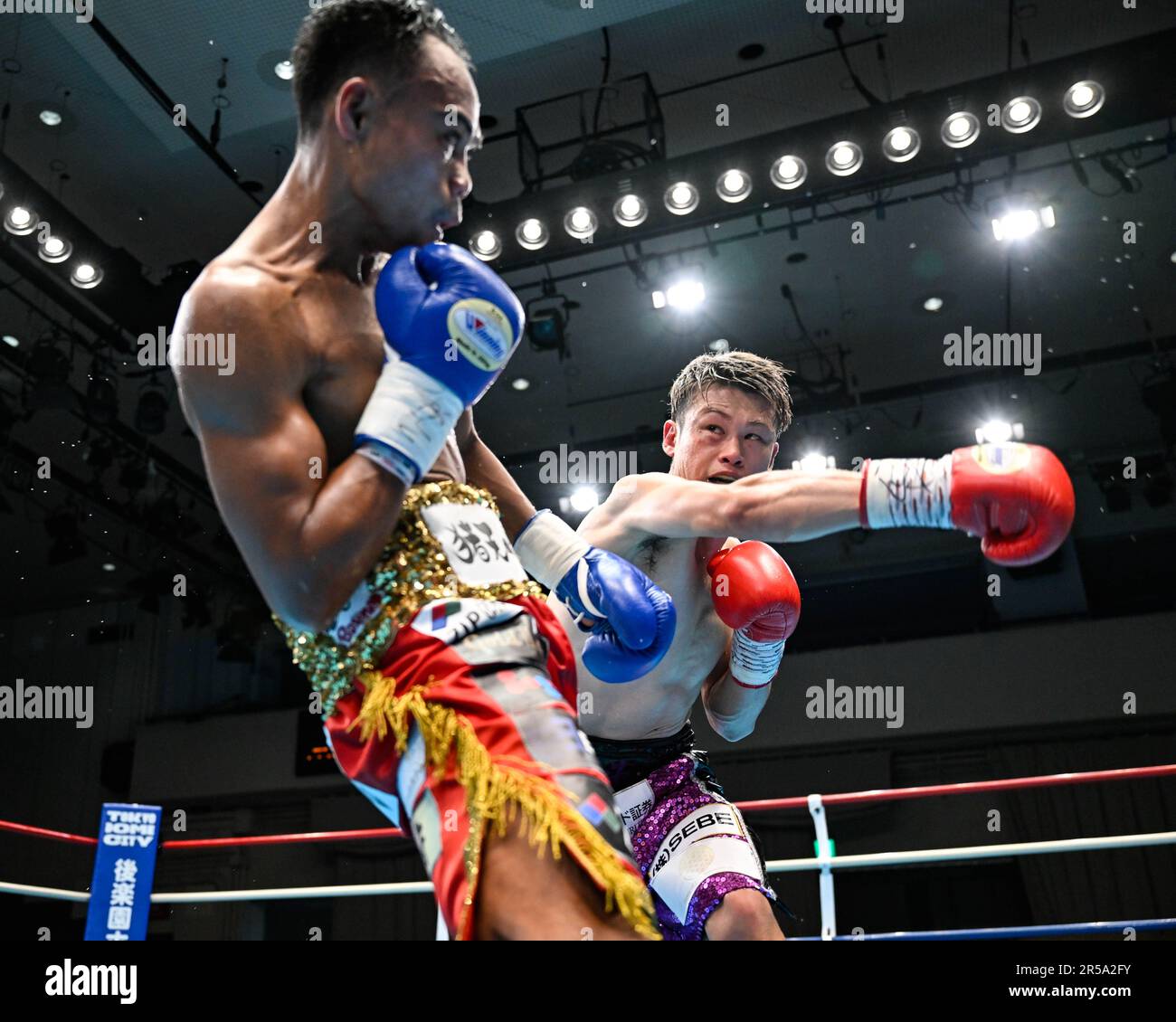 Tokyo, Japan. 31st May, 2023. Hayato Tsutsumi (red gloves) of Japan and ...