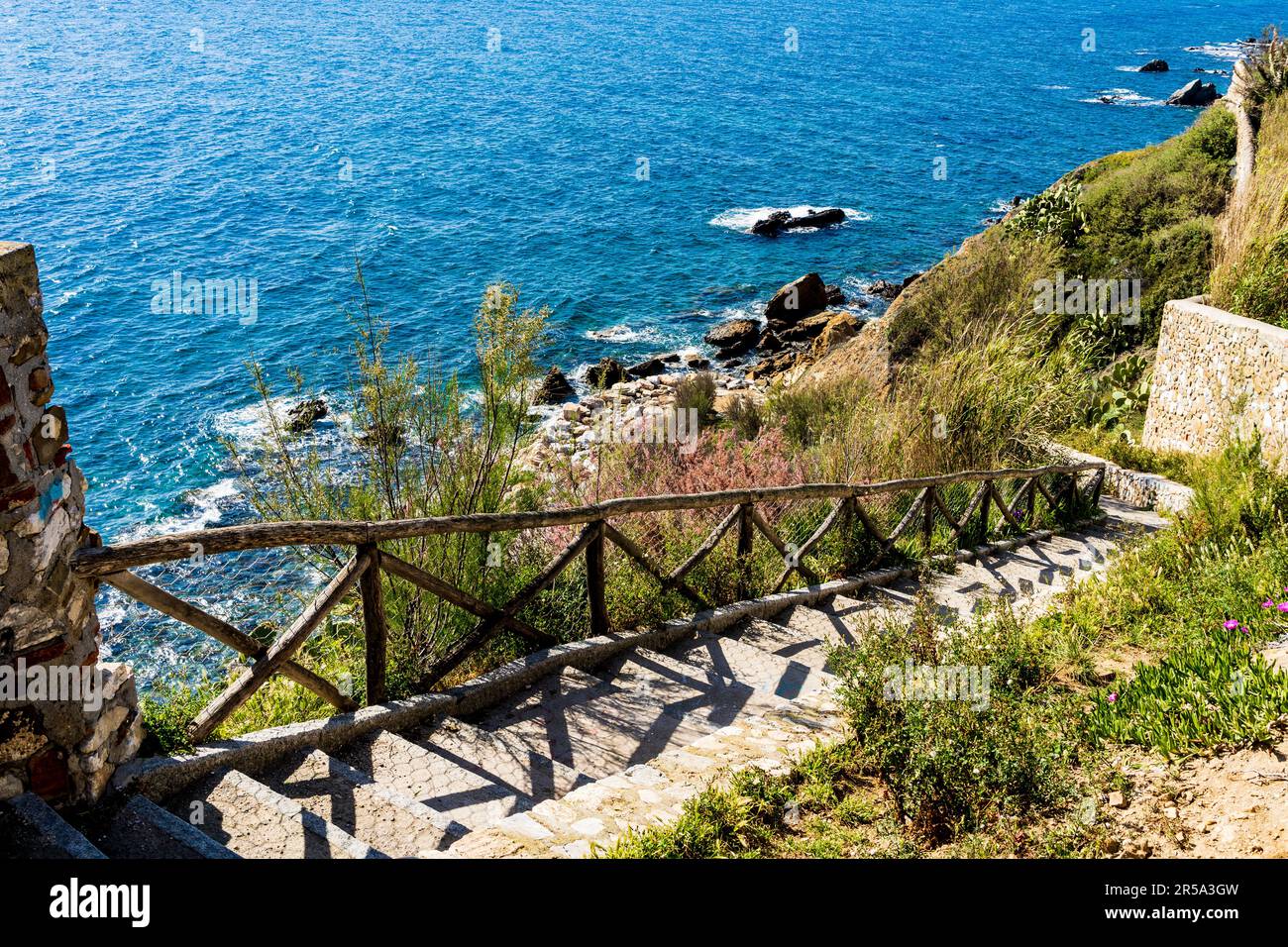 Stairs on cliff along the coast of Piombino, in the Belvedere Elisa ...