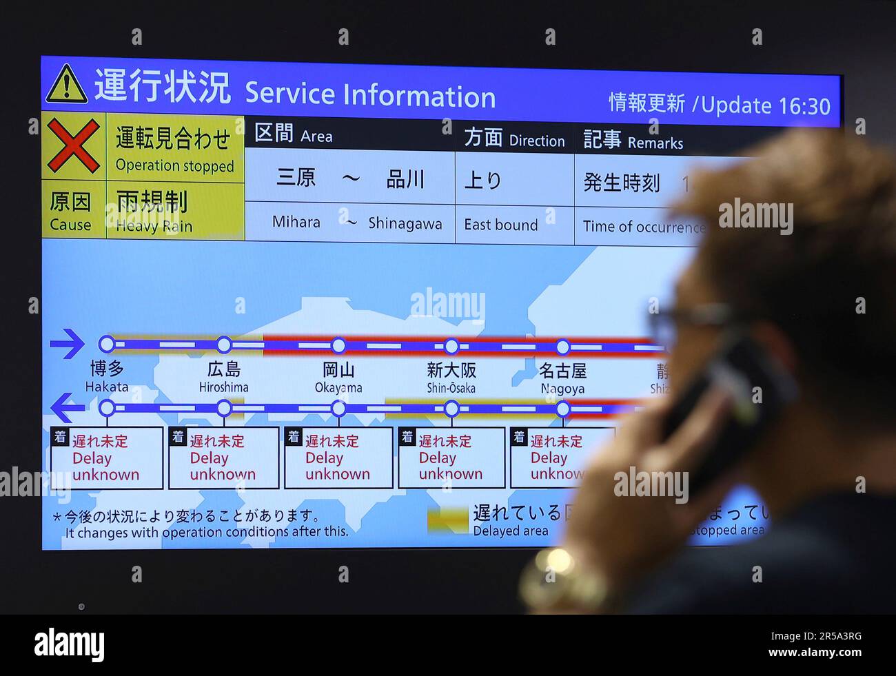 An electric board indicates the operation service of the Shinkansen ...