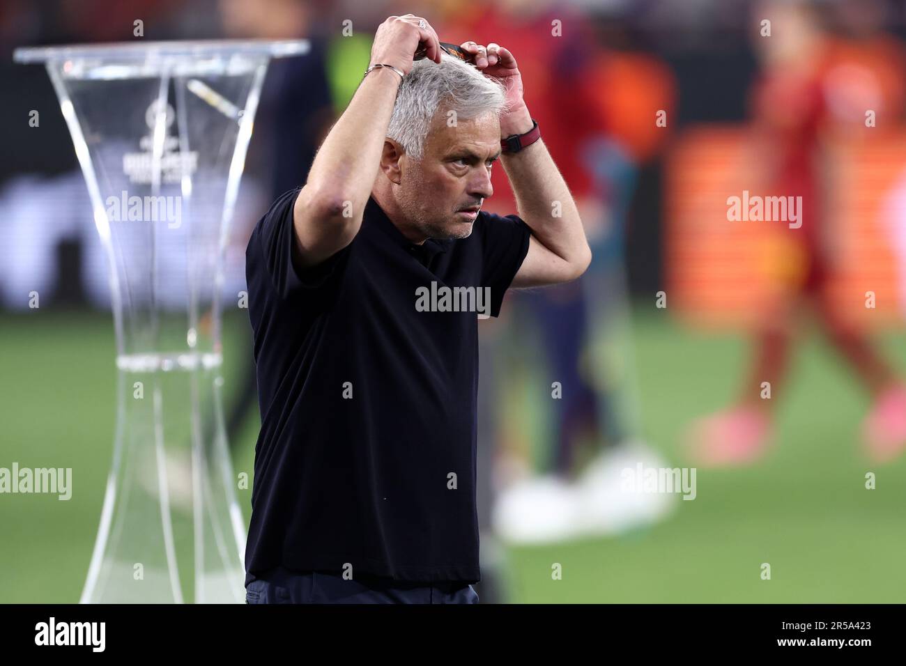 Jose Mourinho, head coach of As Roma looks dejected at the end of the ...