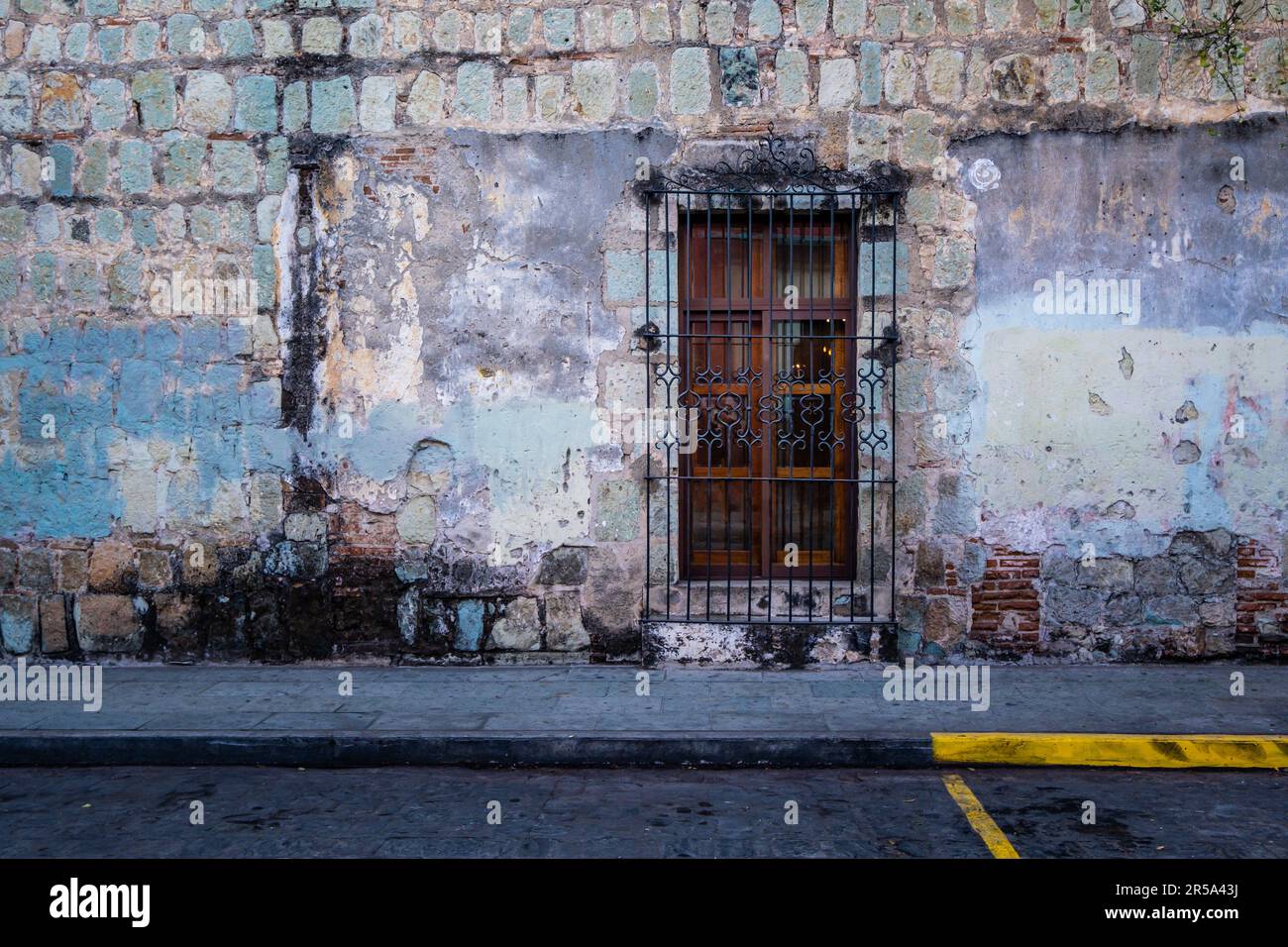 Rough cantera stone of building in colonial center of Oaxaca, Mexico ...
