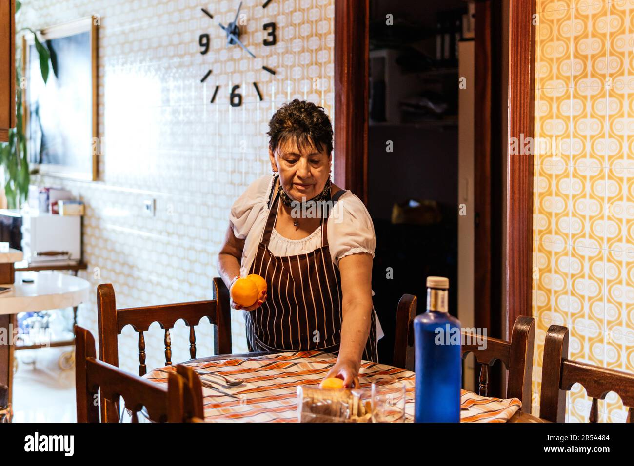 Woman putting things on table hi-res stock photography and images - Alamy