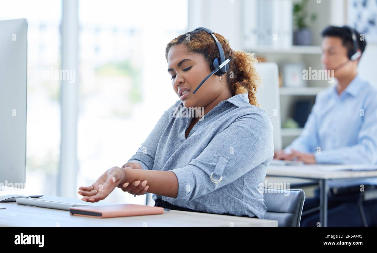Call center, wrist pain and woman in office suffering carpal tunnel ...