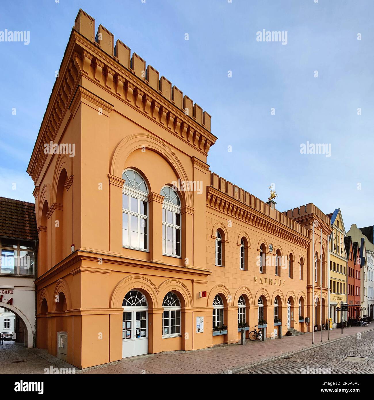 Old town hall, Tudor style facade, crenellated with two corner ...