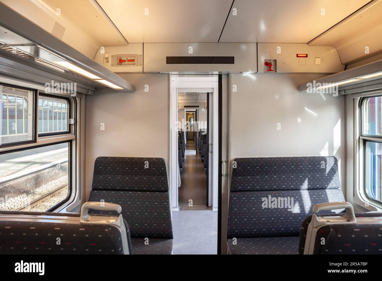 Picture of a typical seat from a European train, empty, en route ...