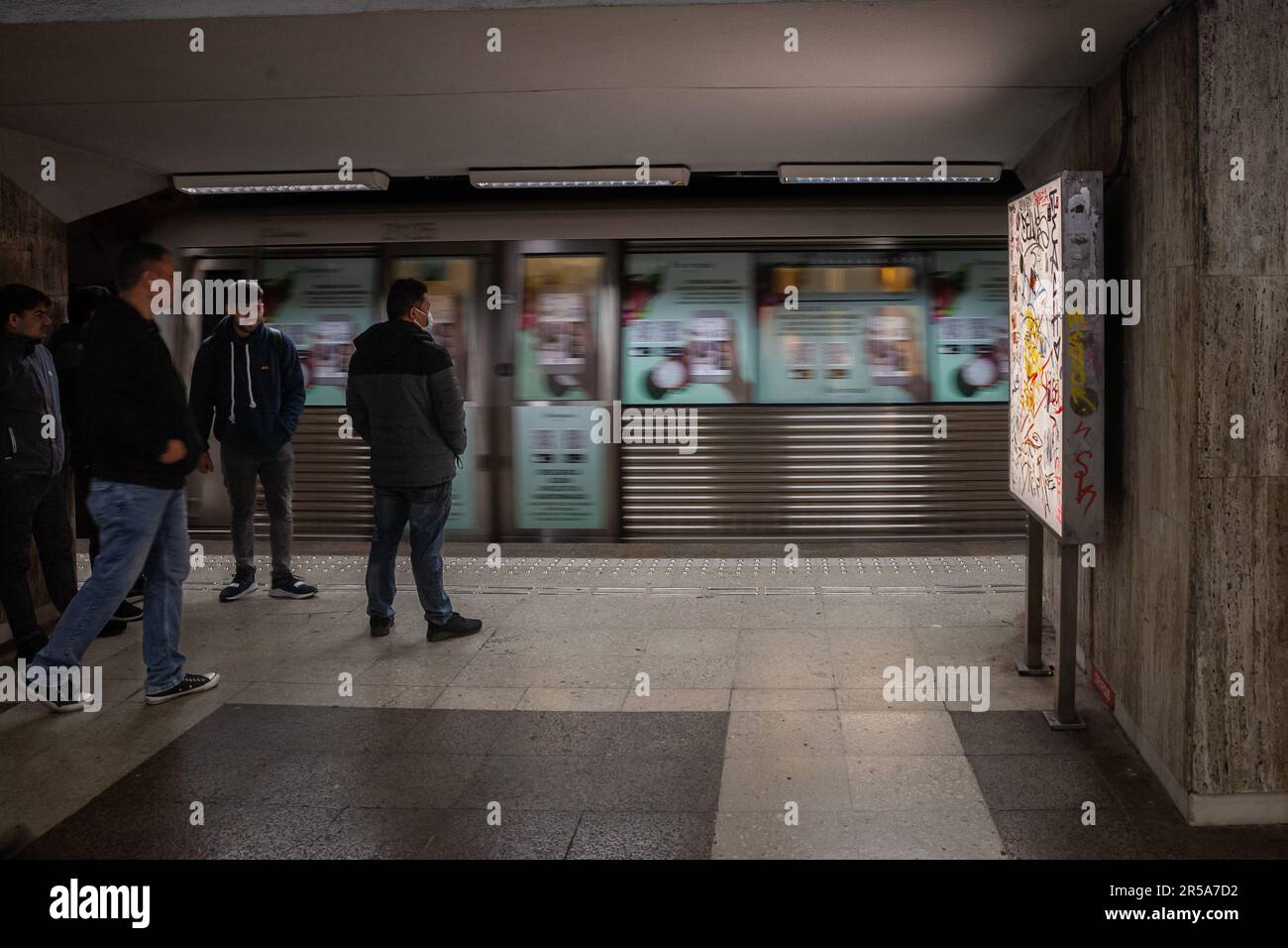 Picture of a metro of Bucharest Metro, on Line 2, with people waiting ...
