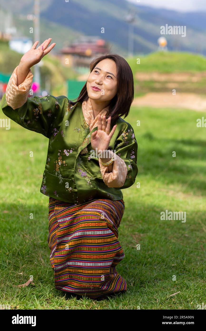 A performer from the Royal Academy of Performing Arts (RAPA) in Thimphu ...