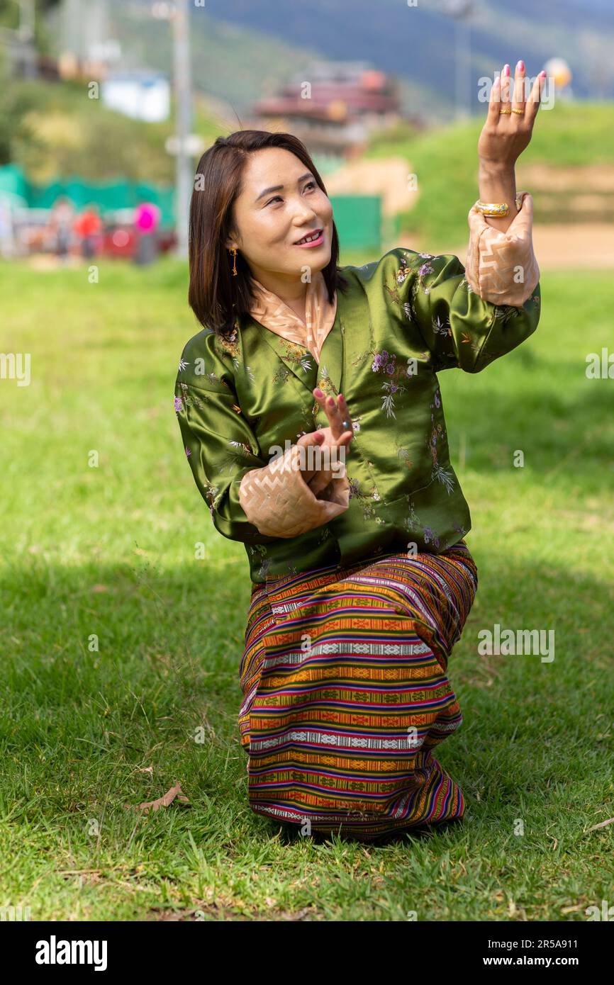 A performer from the Royal Academy of Performing Arts (RAPA) in Thimphu ...
