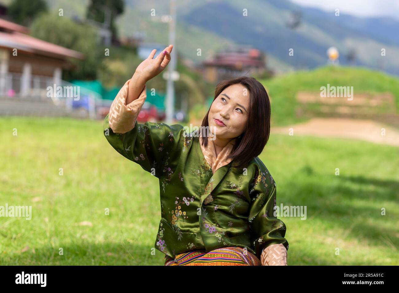 A performer from the Royal Academy of Performing Arts (RAPA) in Thimphu ...