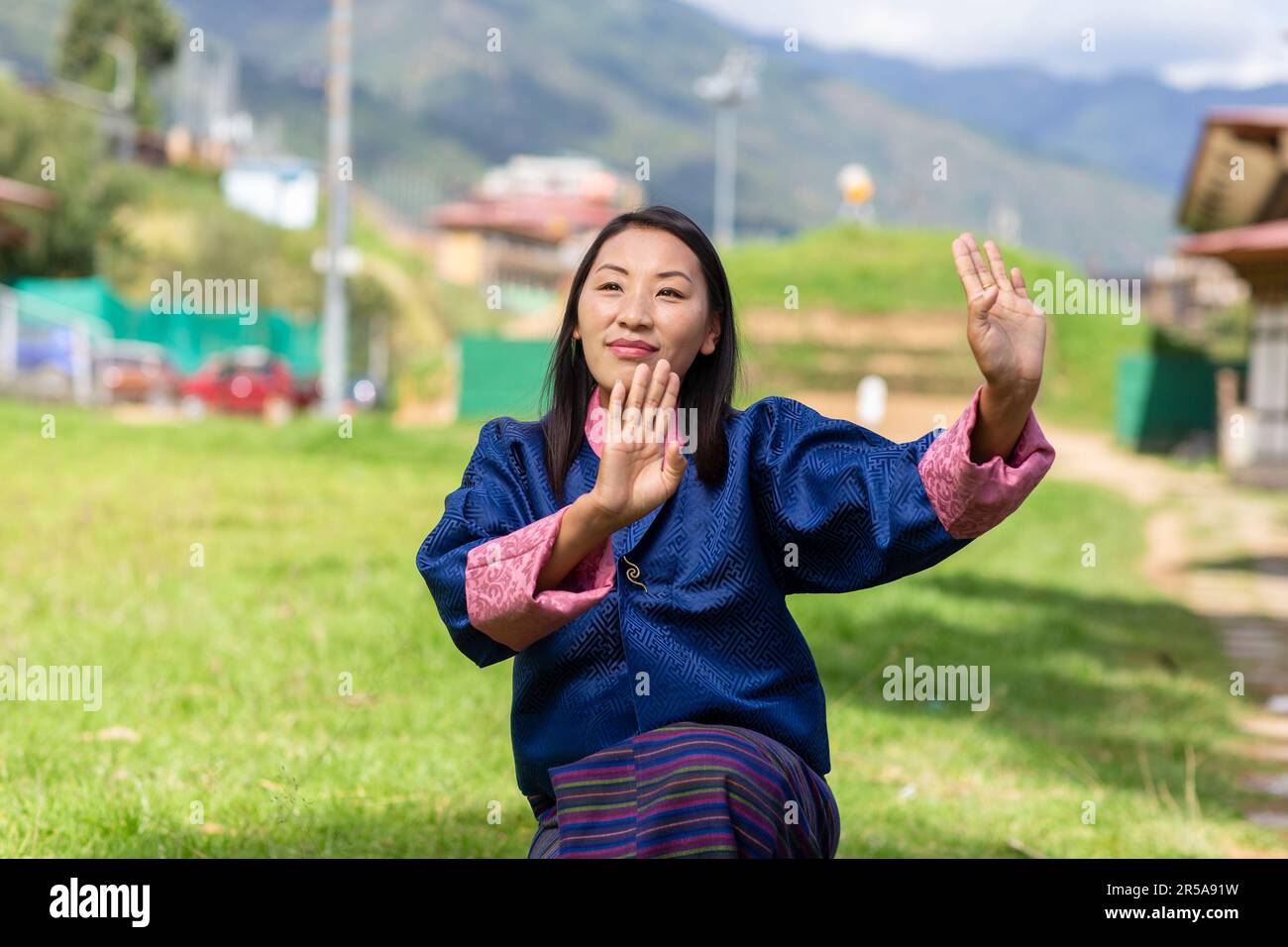 A performer from the Royal Academy of Performing Arts (RAPA) in Thimphu ...