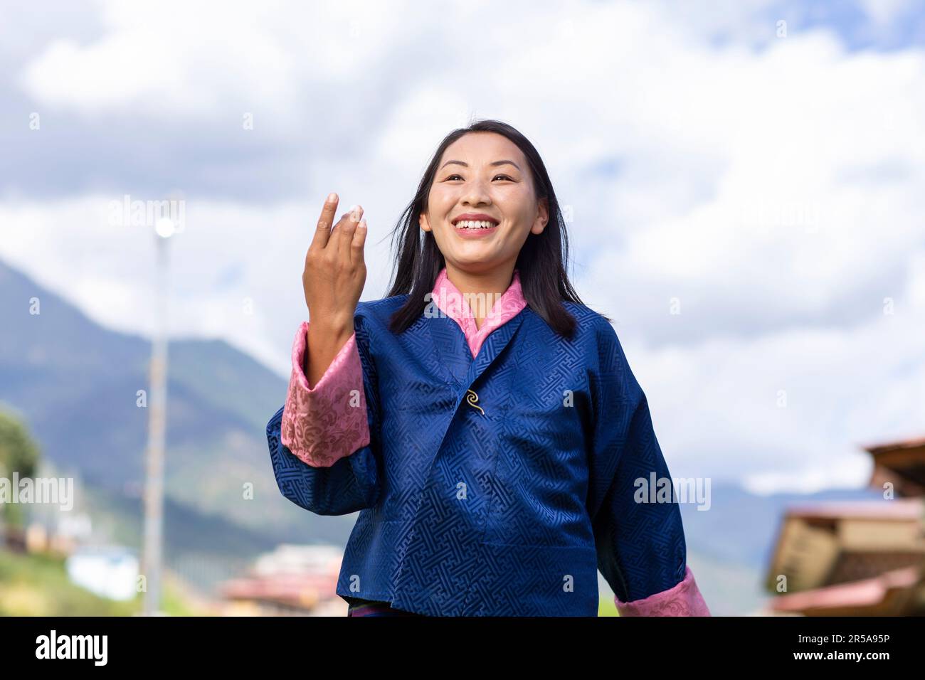A performer from the Royal Academy of Performing Arts (RAPA) in Thimphu ...