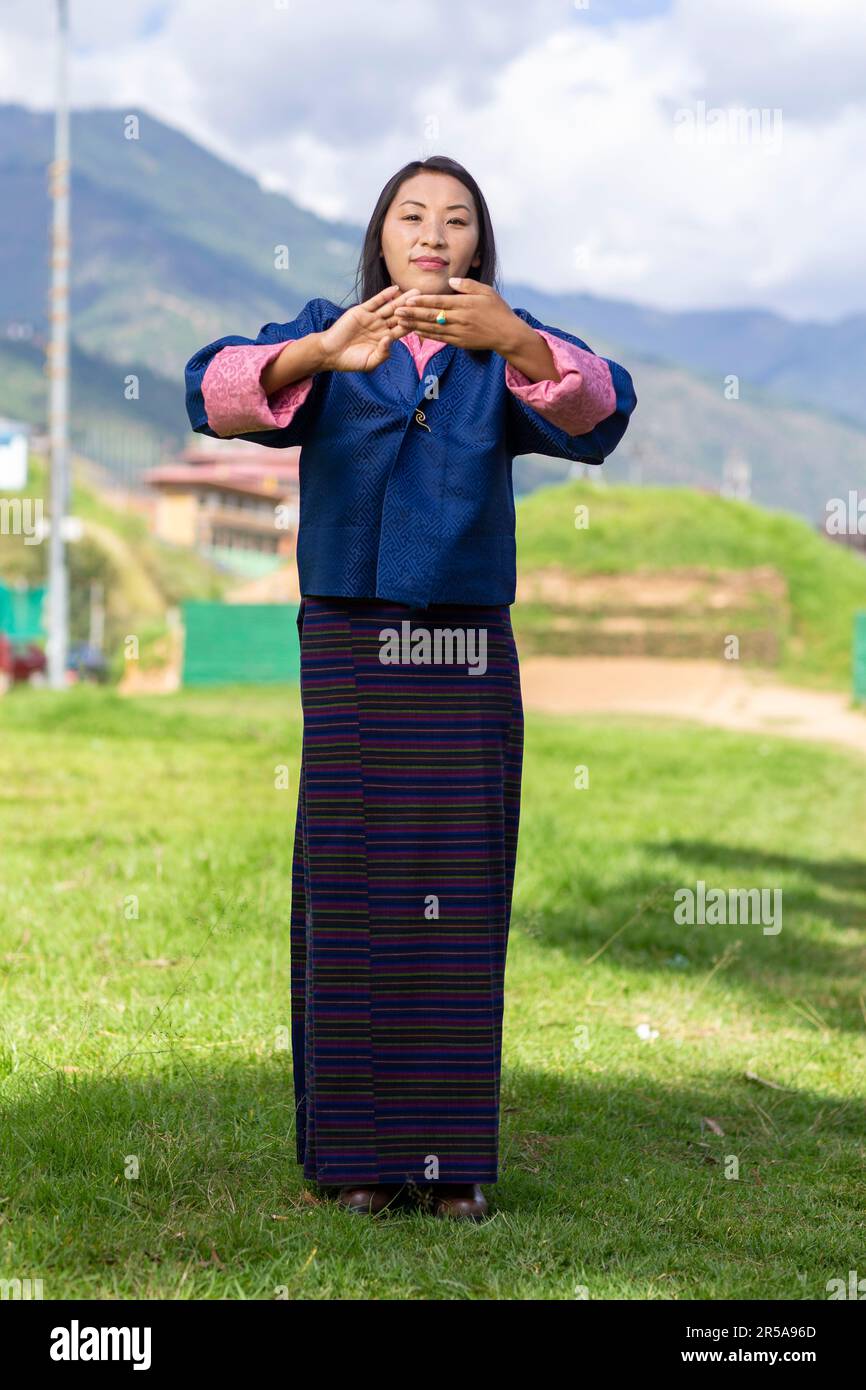A performer from the Royal Academy of Performing Arts (RAPA) in Thimphu ...