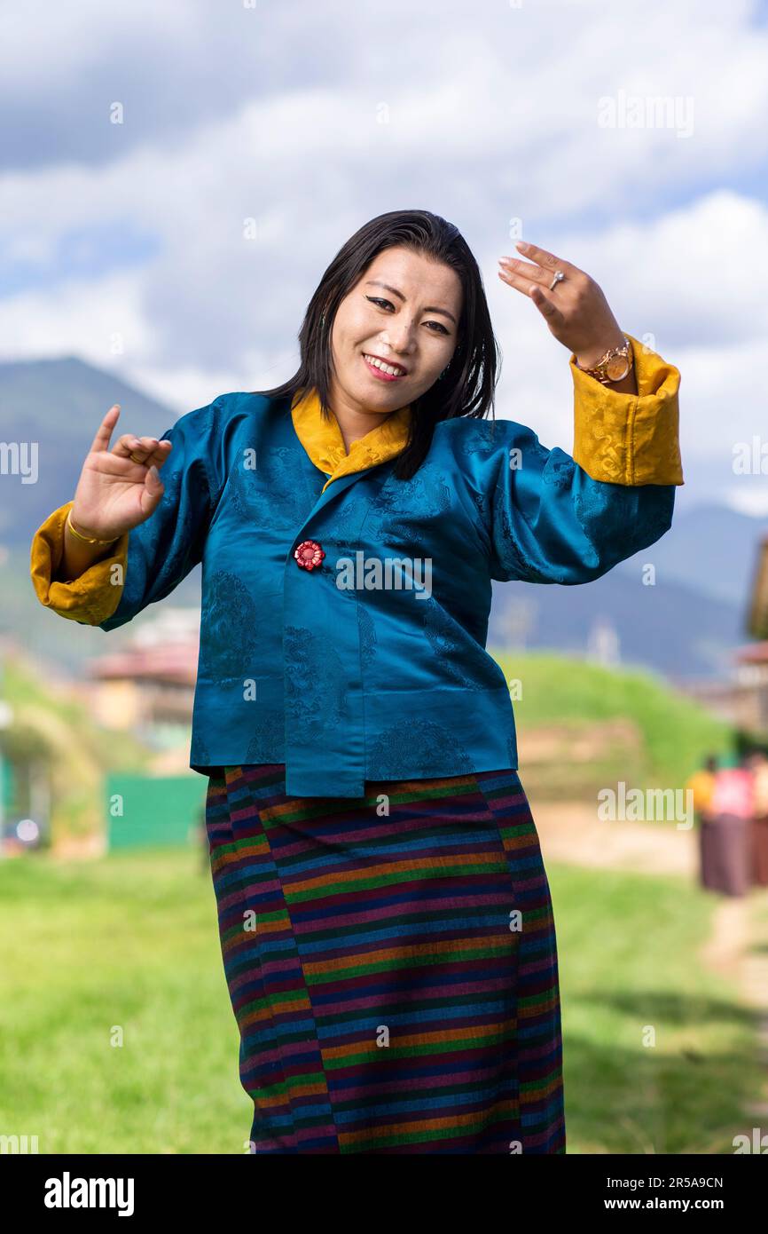 A performer from the Royal Academy of Performing Arts (RAPA) in Thimphu ...