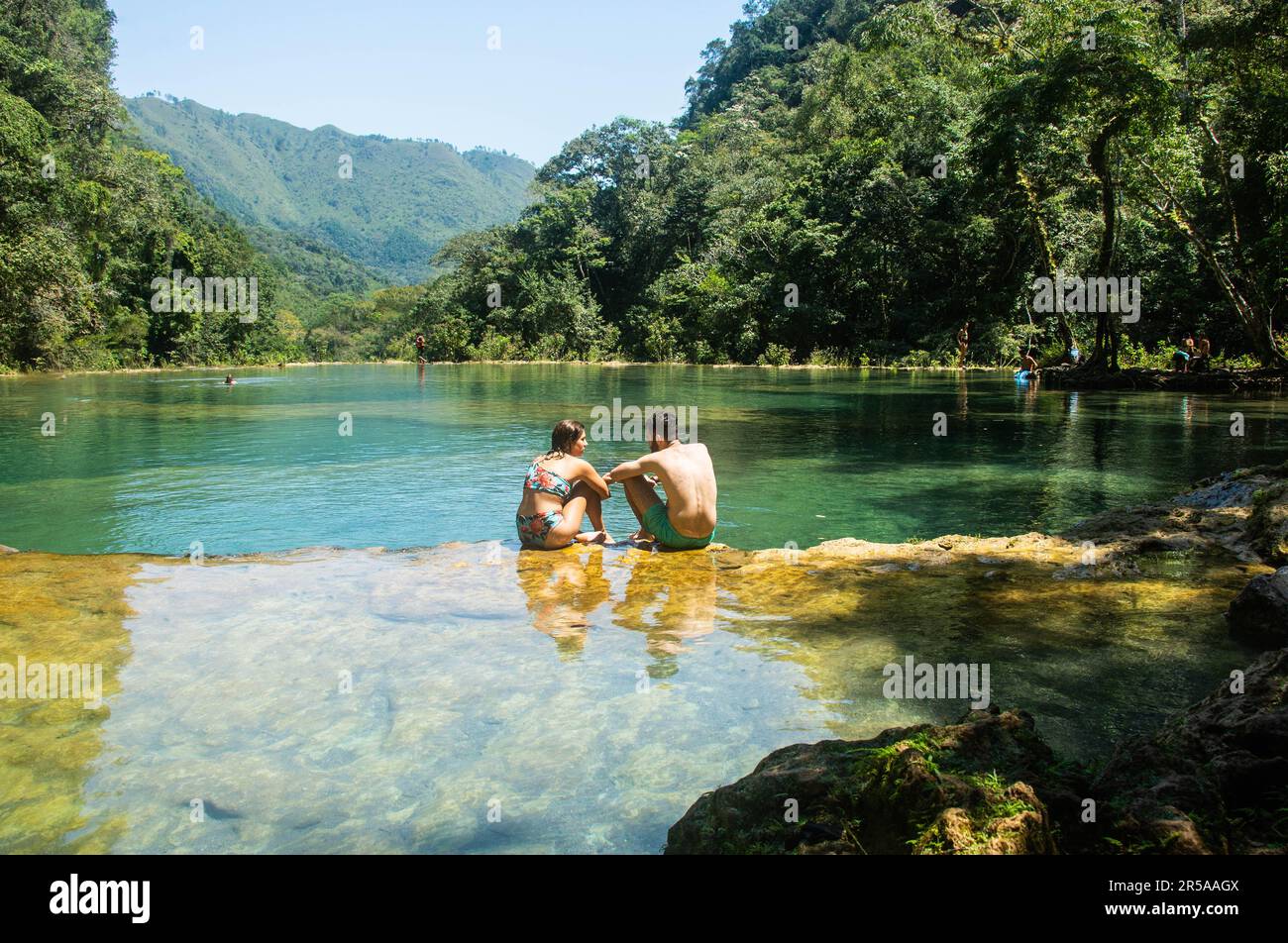 Tourists enjoying the beautiful pools of Semuc Champey, Rio Cabohon ...