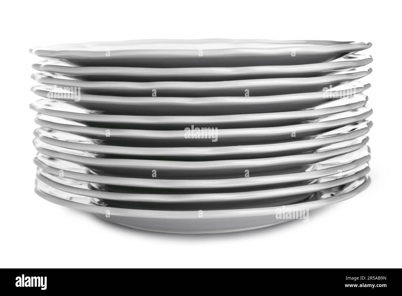 Stack of ceramic plates on white background Stock Photo - Alamy