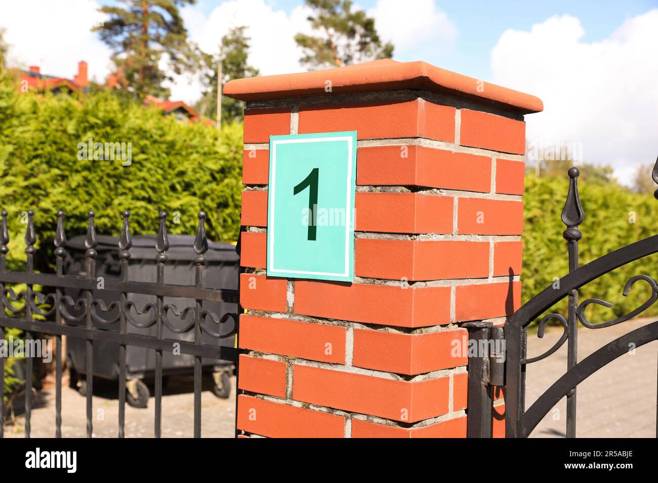 Number 1 on red brick column near house outdoors Stock Photo - Alamy
