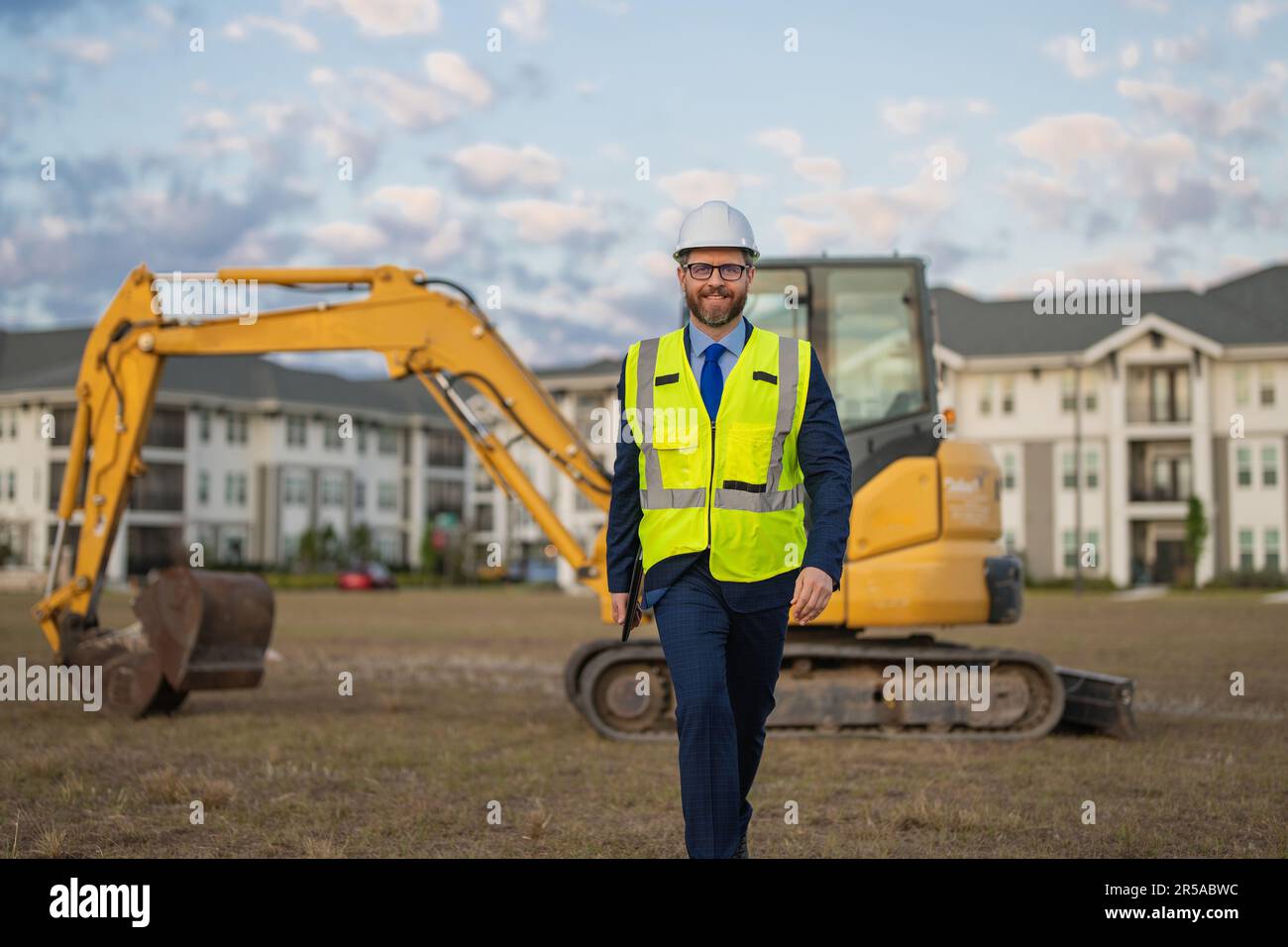 Builder engineer or civil engineer worker at a construction site ...