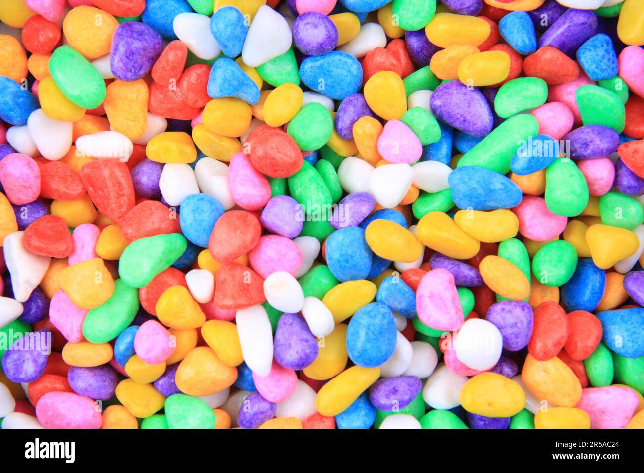boulders with plastic colors as nice background Stock Photo - Alamy