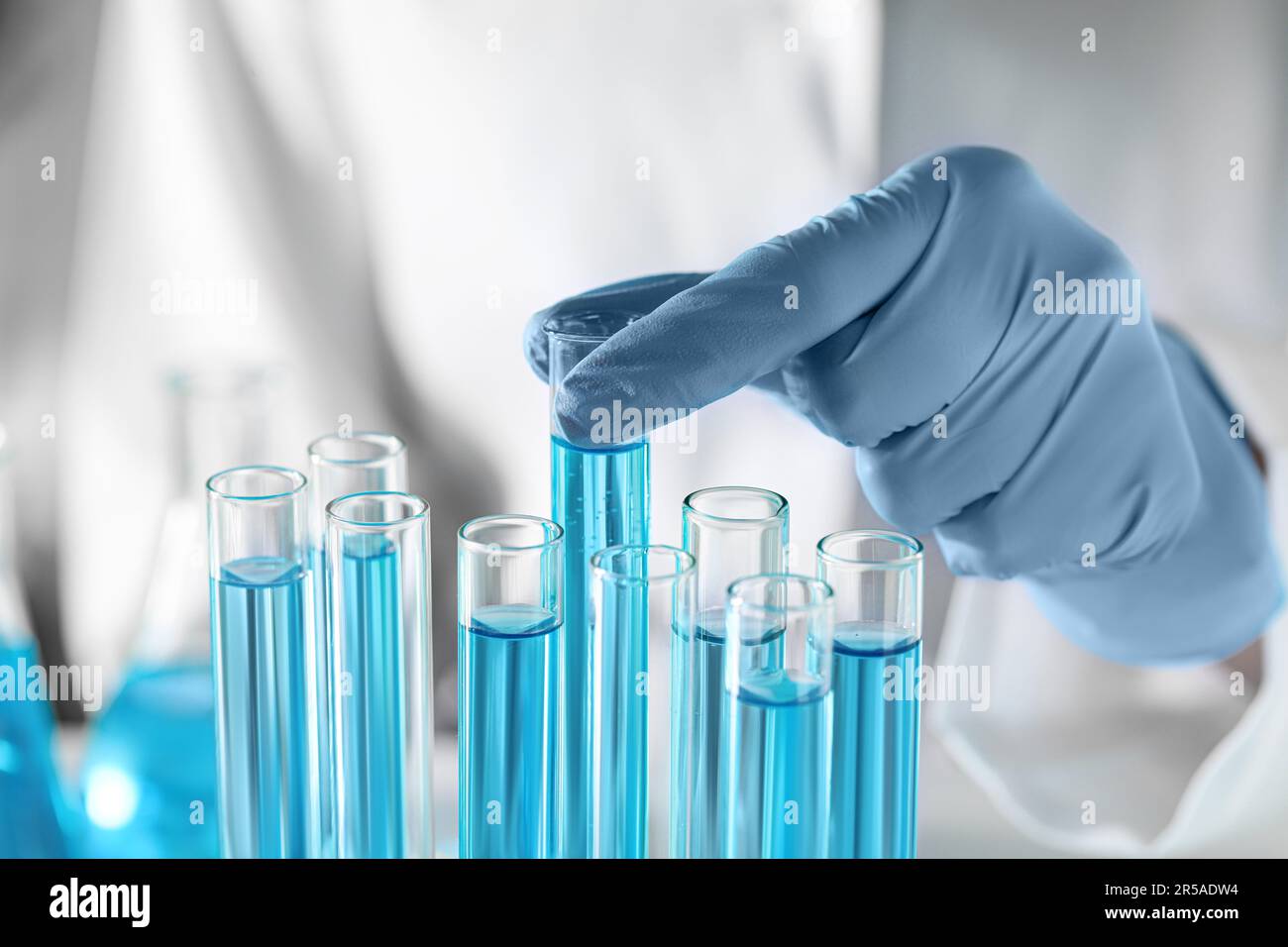 Scientist taking sample light hi-res stock photography and images - Alamy