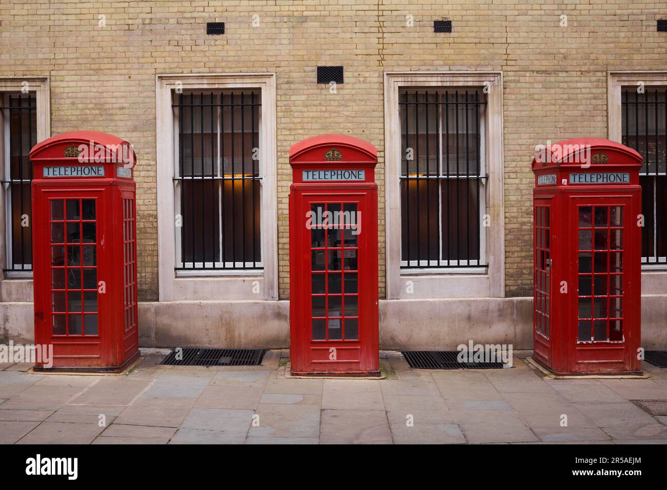 Three red booths on a row in Broad Court, Covent Garden, London, UK ...