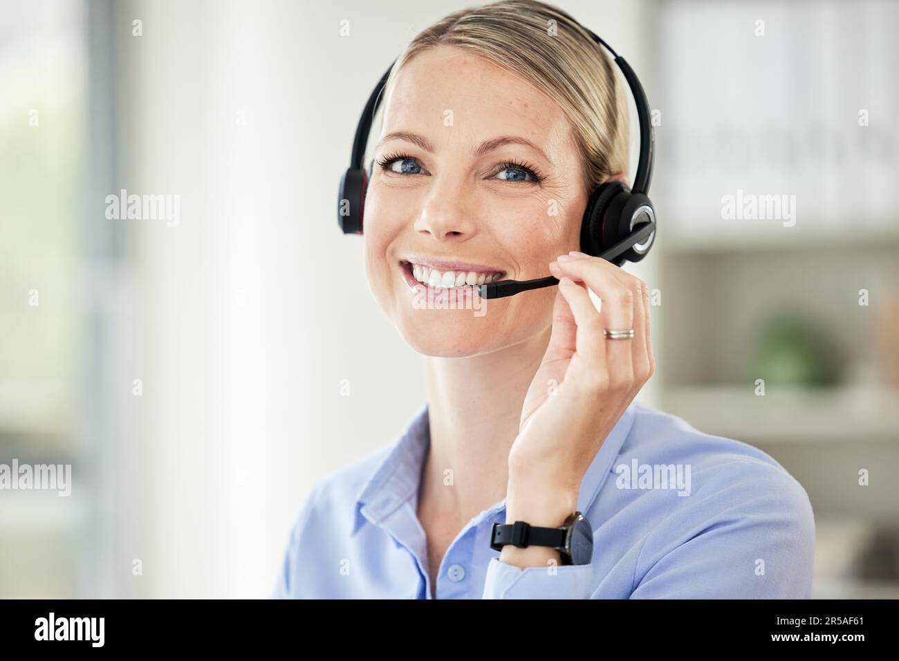 Consultant, portrait of woman call center agent and with headset at her workplace office ...