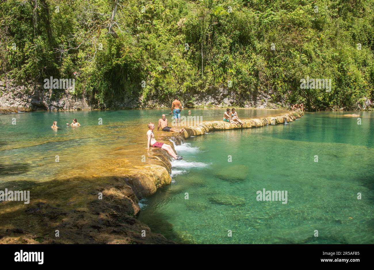 Tourists enjoying the beautiful pools of Semuc Champey, Rio Cabohon ...