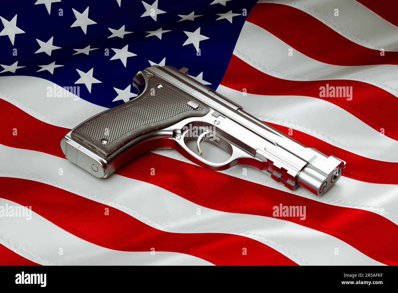 Shiny pistol with the American flag in the background. Silver gun ...