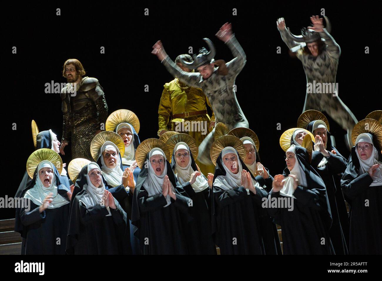 rear left: Roberto Tagliavini (Ferrando) in IL TROVATORE at at The ...