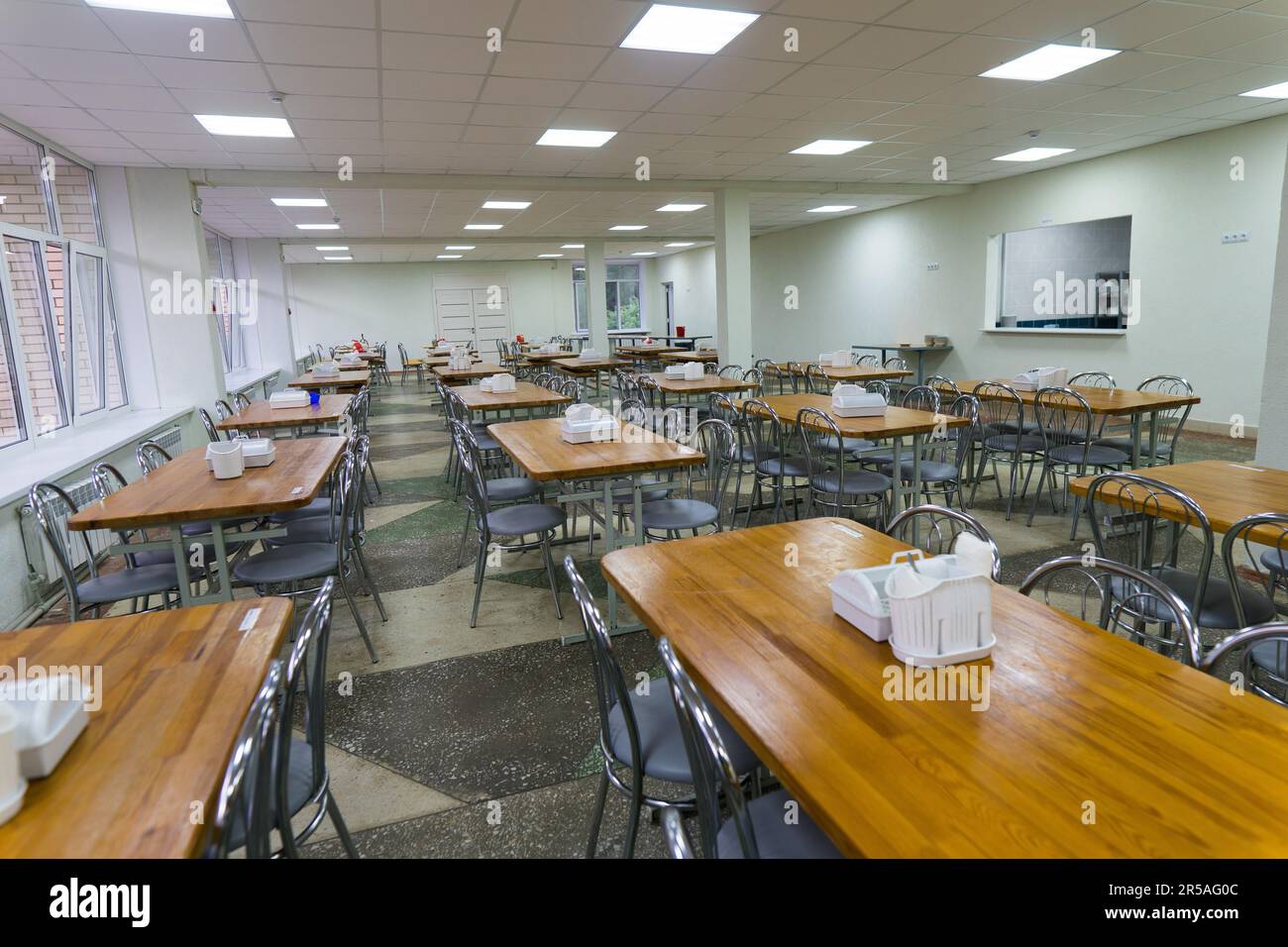 Chairs and tables. The dining hall in school is quarantined, isolation ...
