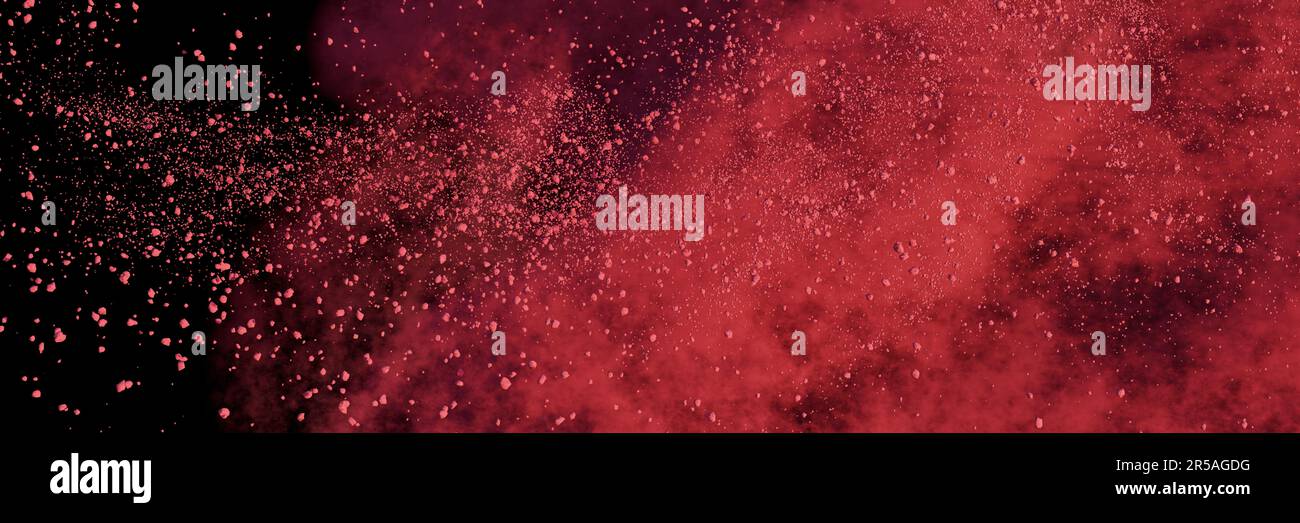 red particles flying, colored powder isolated on black background ...