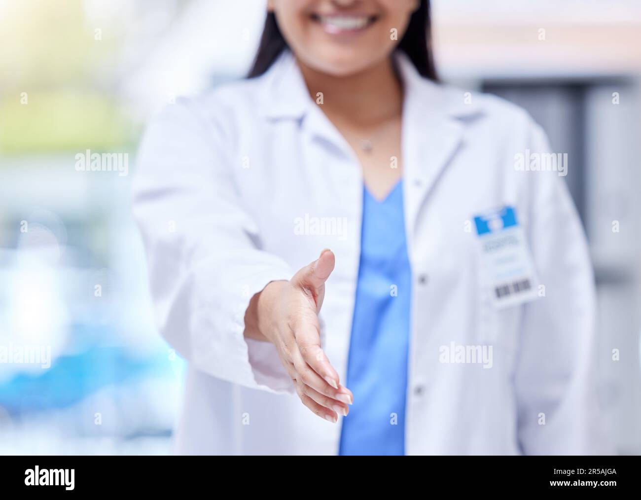 Doctor, open hand shake and woman with welcome, respect or greeting in ...