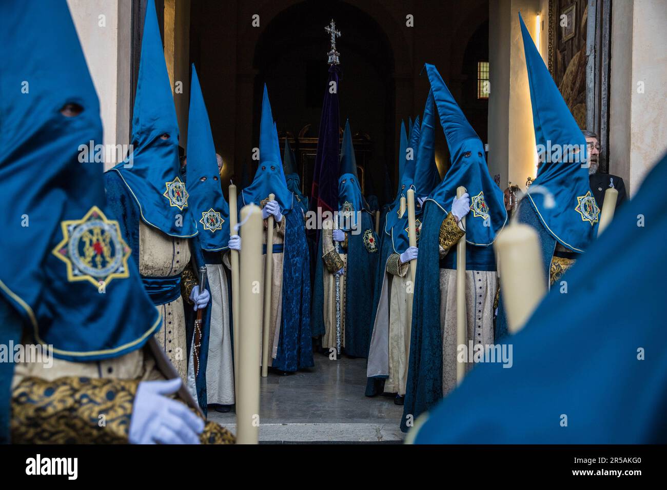 Blue capirote procession during the holy week in Grenada, Spain ...