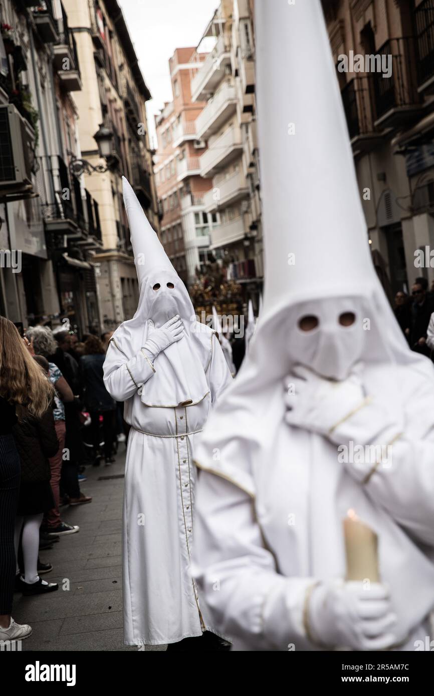 Capirotes during a procession for the holy week in Grenada, Spain ...