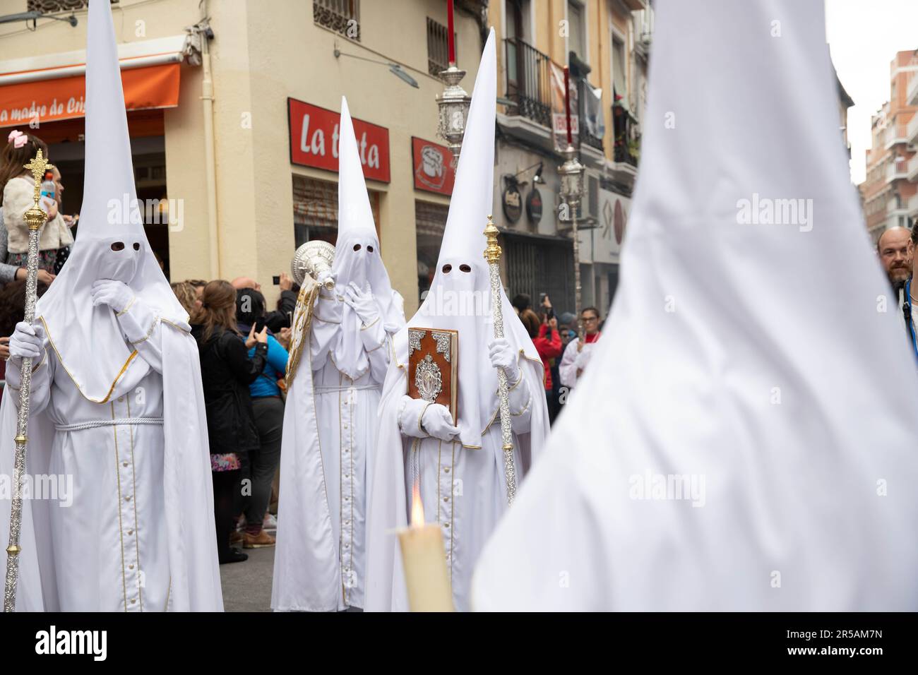 Capirotes during a procession for the holy week in Grenada, Spain ...