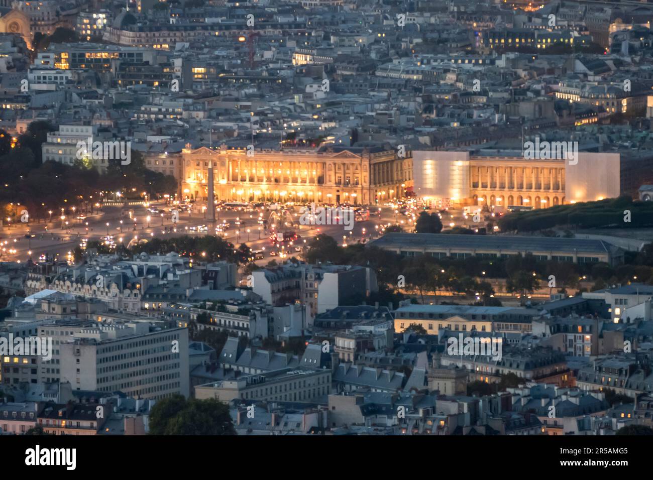 Aerial view of Square of the Concorde in Paris at dusk with the city ...
