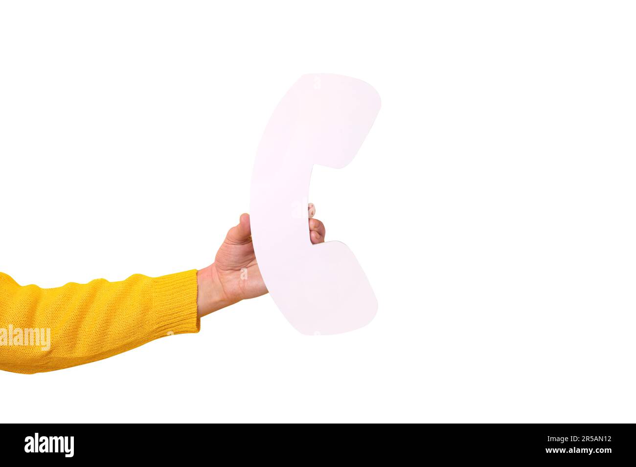 Hand holding symbol of telephone receiver isolated on white background ...