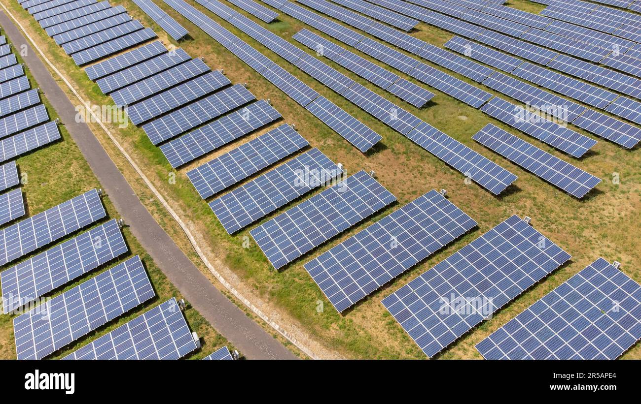 solar panels on the field Stock Photo - Alamy