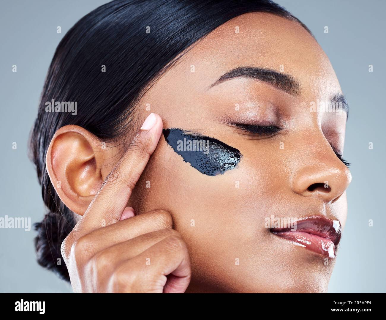 Charcoal mask, face treatment and woman with cosmetics, natural beauty ...