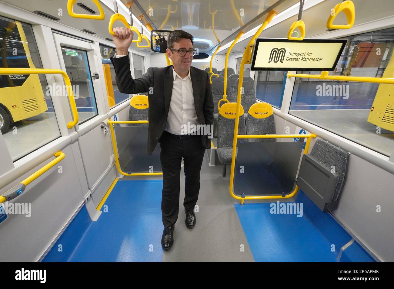 Greater Manchester mayor Andy Burnham views the 'Bee Network' buses at ...