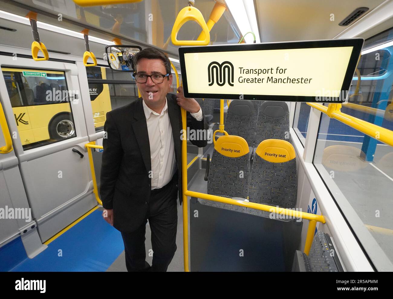 Greater Manchester mayor Andy Burnham views the 'Bee Network' buses at ...