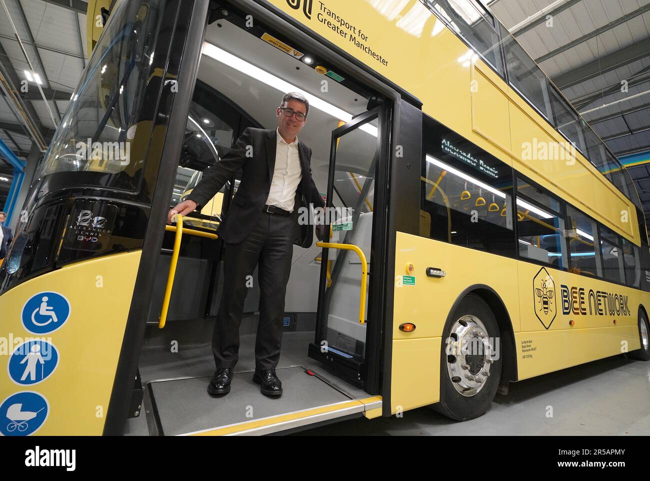 Greater Manchester mayor Andy Burnham views the 'Bee Network' buses at ...