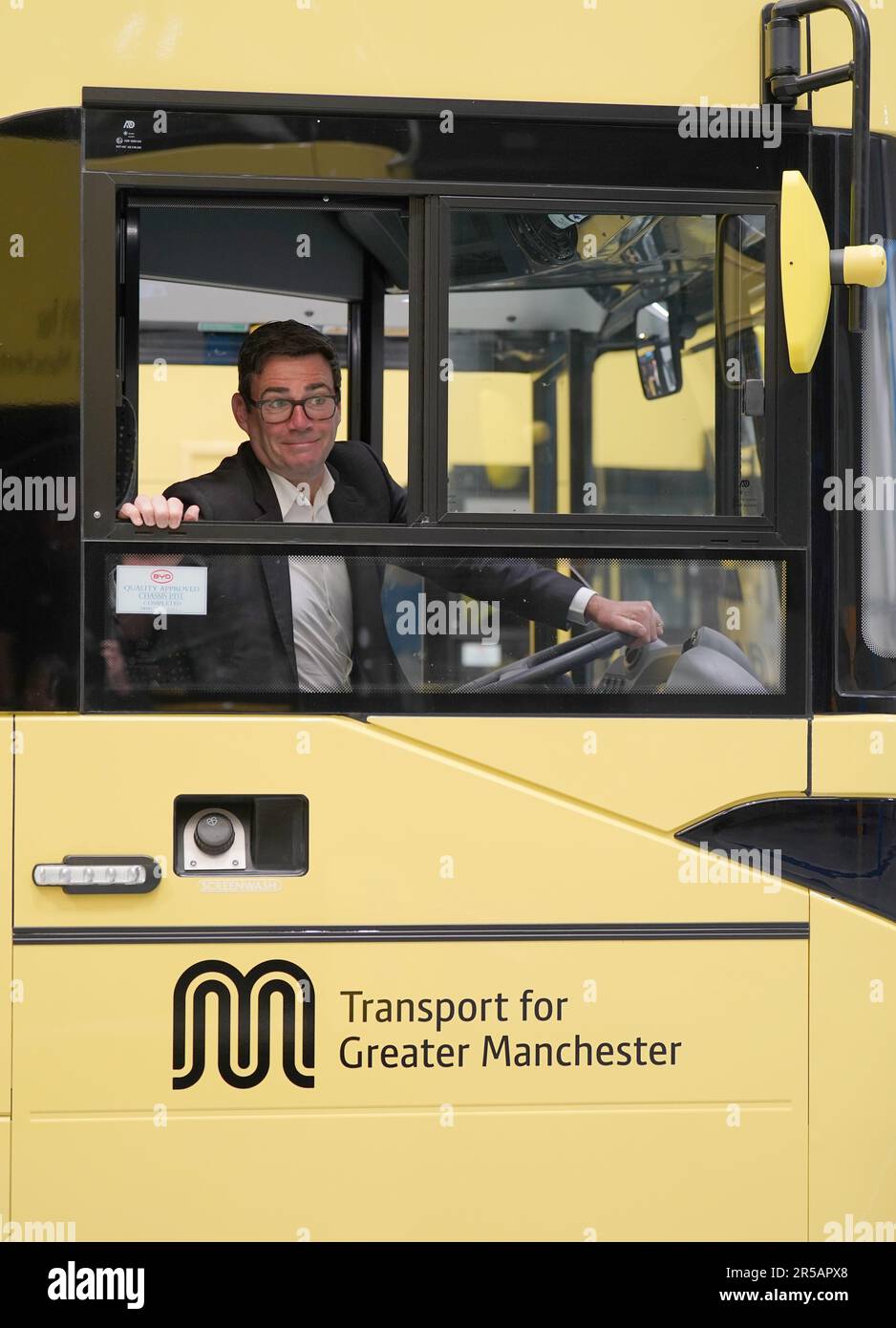 Greater Manchester mayor Andy Burnham views the 'Bee Network' buses at ...
