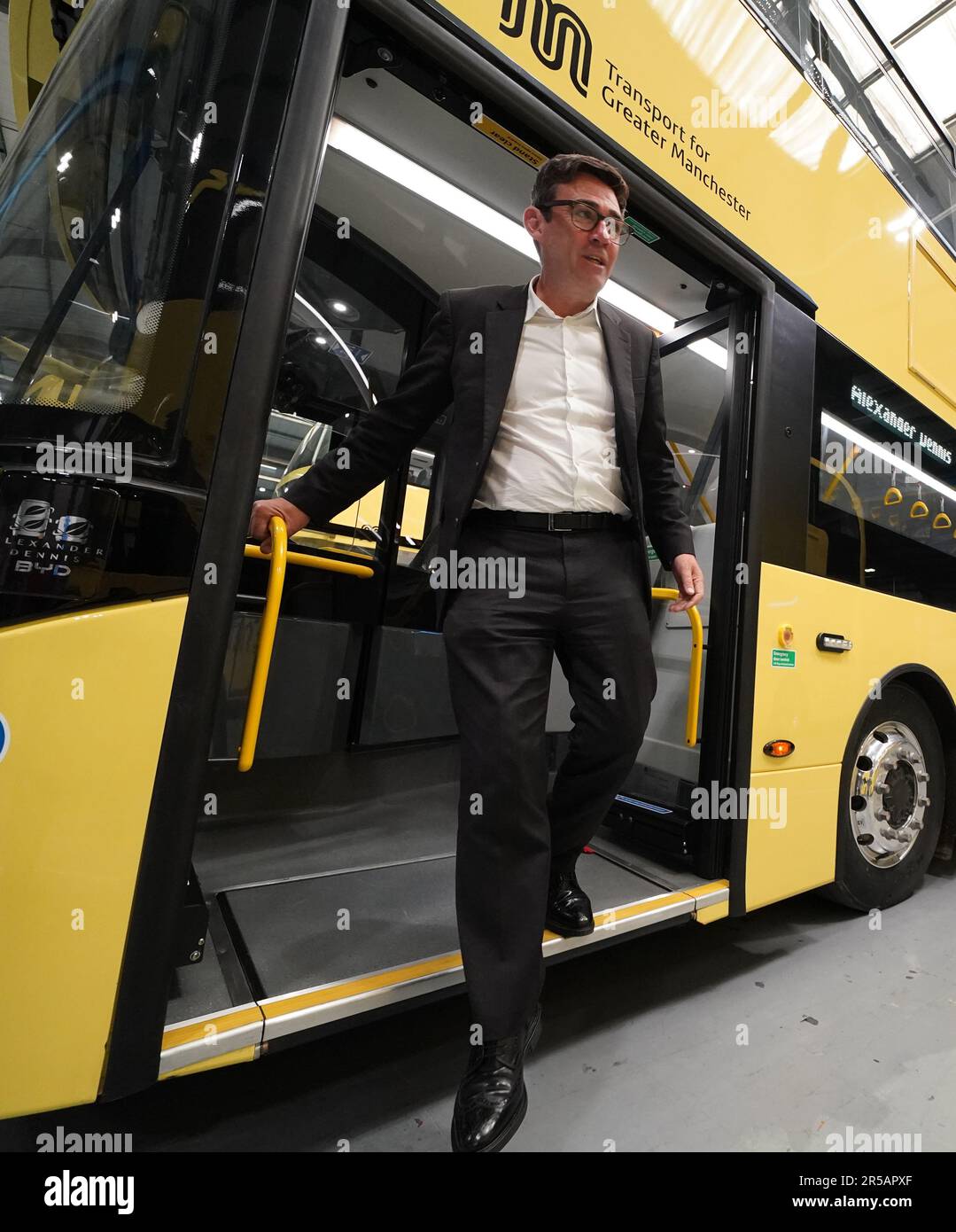 Greater Manchester mayor Andy Burnham views the 'Bee Network' buses at ...